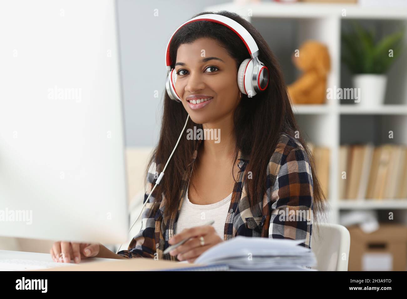 Attractive young female use computer Stock Photo - Alamy