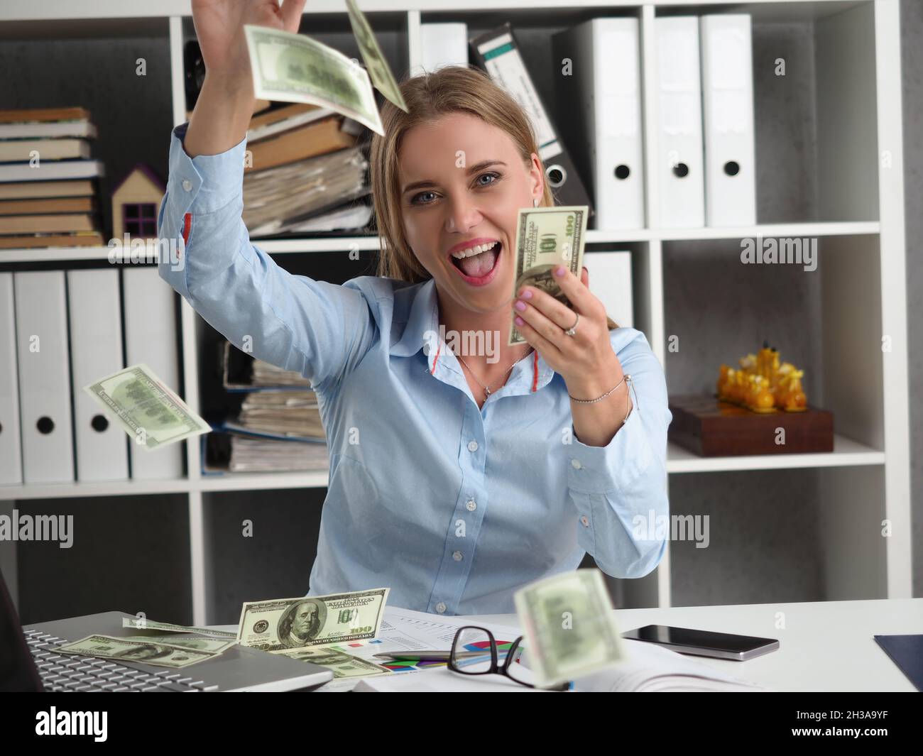 Money reward for good work Stock Photo - Alamy