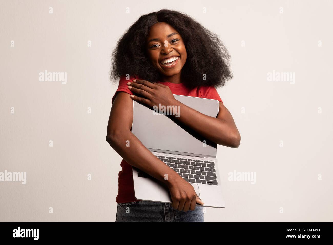 Tech Lover Concept. Cheerful Black Lady Hugging Laptop With Blank ...