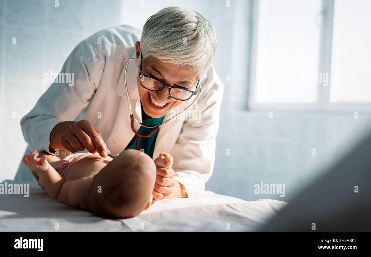 Pediatric doctor exams little baby. Health care, medical examination ...