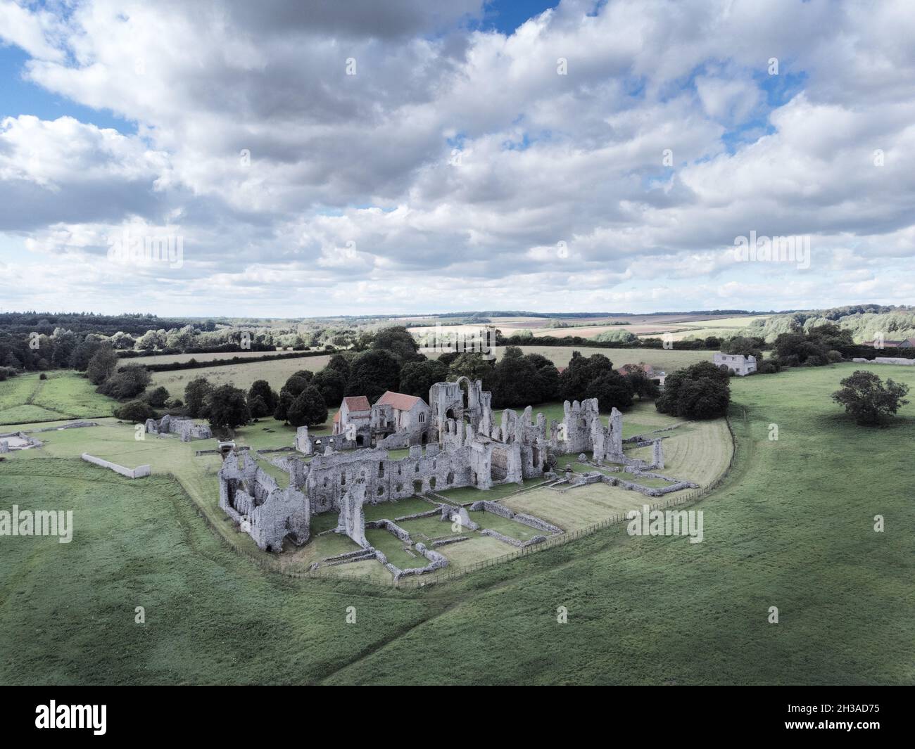 aerial view landscape image of the ruins of Castle Acre Priory a ...