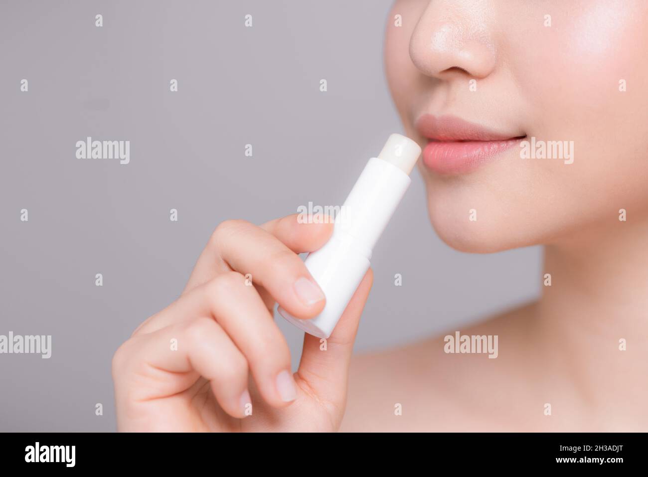 Apply lip woman balm hi-res stock photography and images - Alamy