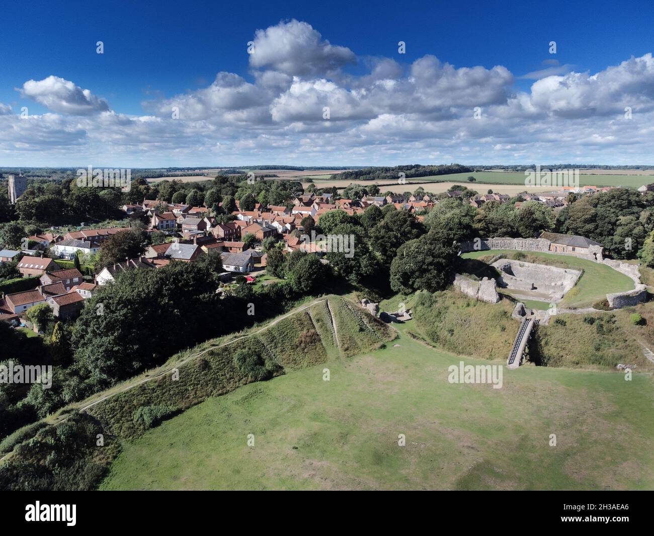 aerial landscape image of a ruined medieval building in the village of ...