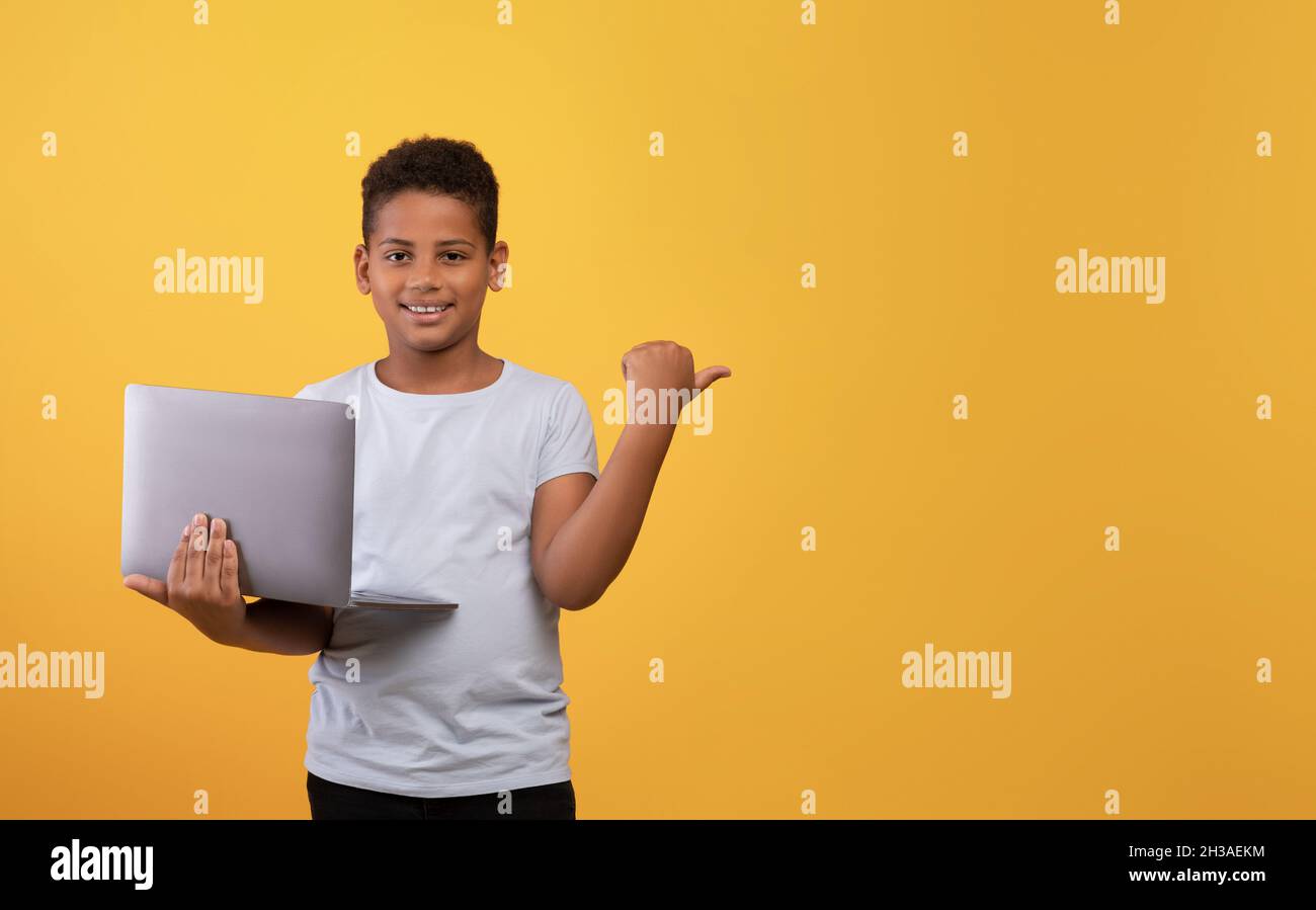 School boy laptop teenager hi-res stock photography and images - Alamy
