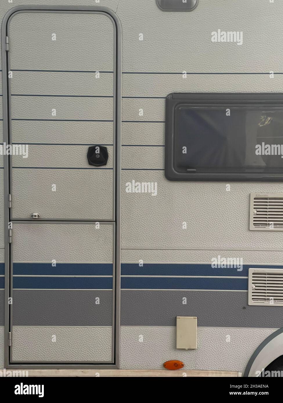Vertical cropped shot of a door of rv camping trailer Stock Photo - Alamy