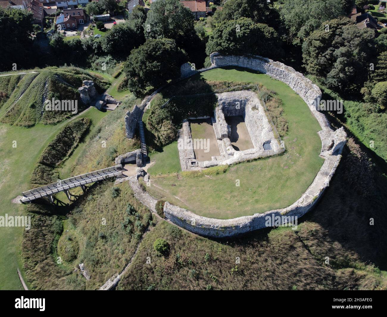 aerial landscape image of a ruined medieval building in the village of ...