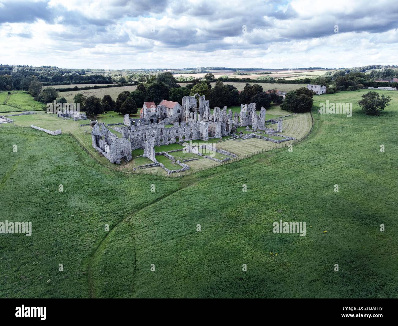 aerial view landscape image of the ruins of Castle Acre Priory a ...