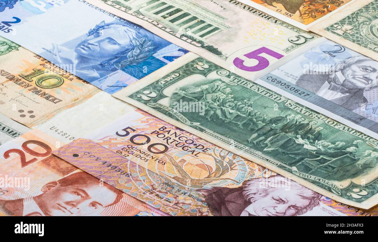 Background with current and old banknotes from some countries Stock ...