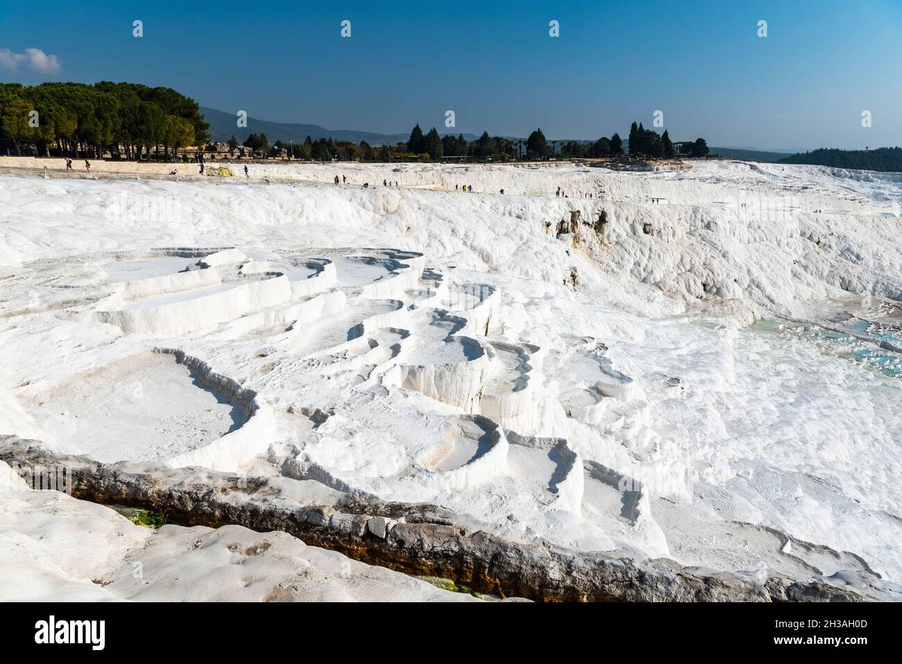 Travertine terrace formations in Pamukkale, Turkey. The area is famous ...