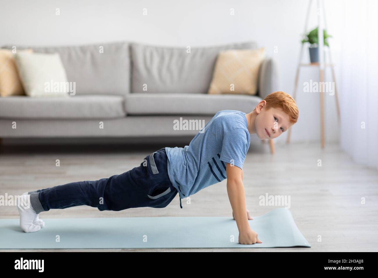 Kid home fitness hi-res stock photography and images - Alamy