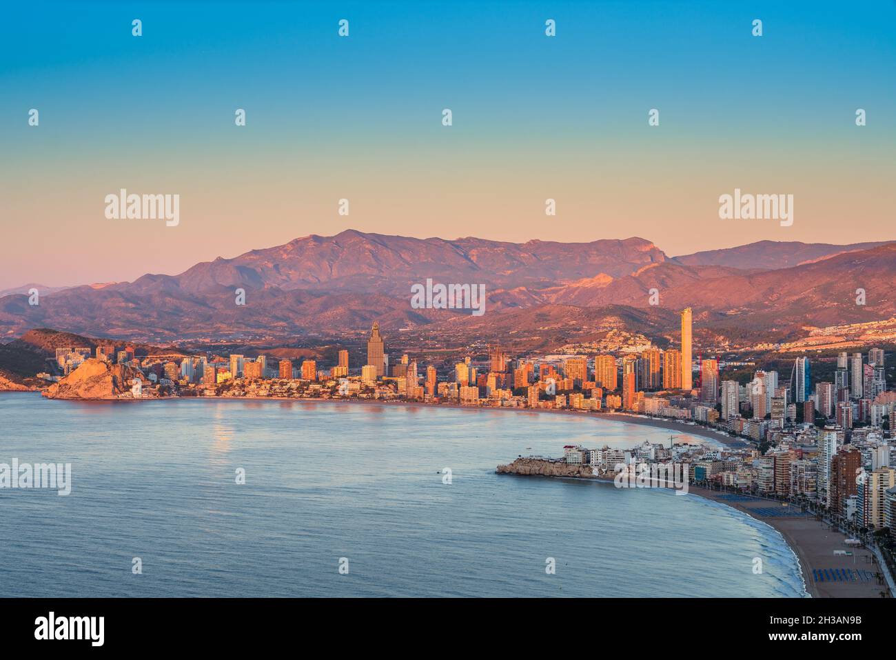 Panoramic View of Benidorm beach at sunrise. Famous Spanish vacational ...