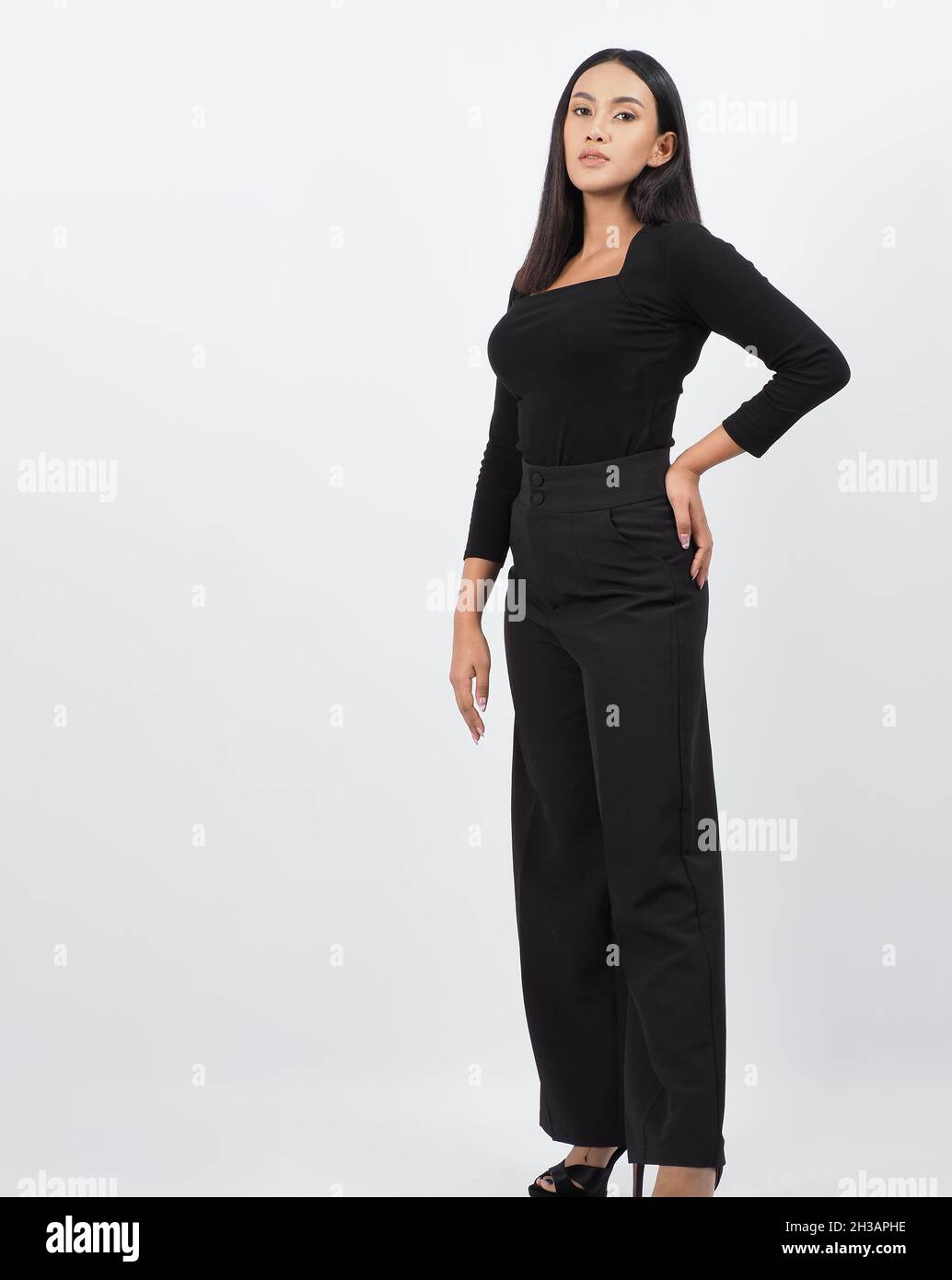 Asian woman full body. Thai woman in a modern chic style stands in ...