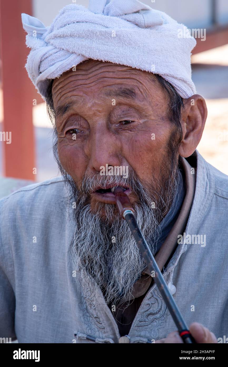 Elder Chinese man with turban at Jingbian, China Stock Photo - Alamy