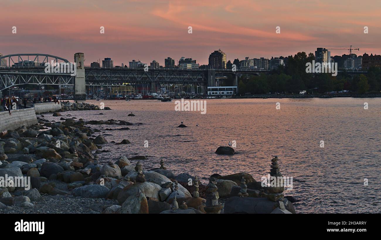 Beautiful evening view of Sunset Beach, Vancouver downtown with crowded ...