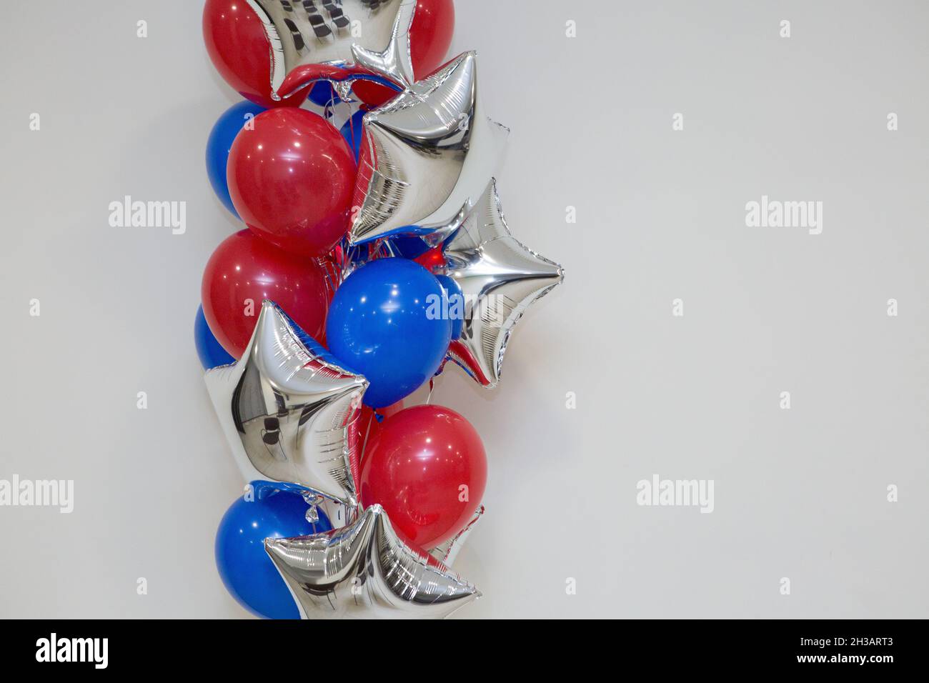 Blue, silver and red balloons. Decorations for the holiday. Blank for a ...