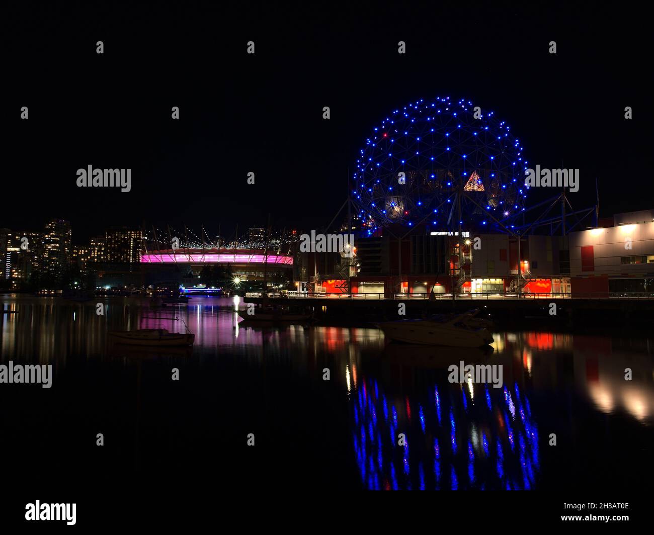 Stunning night view of False Creek bay with Vancouver Science World and ...