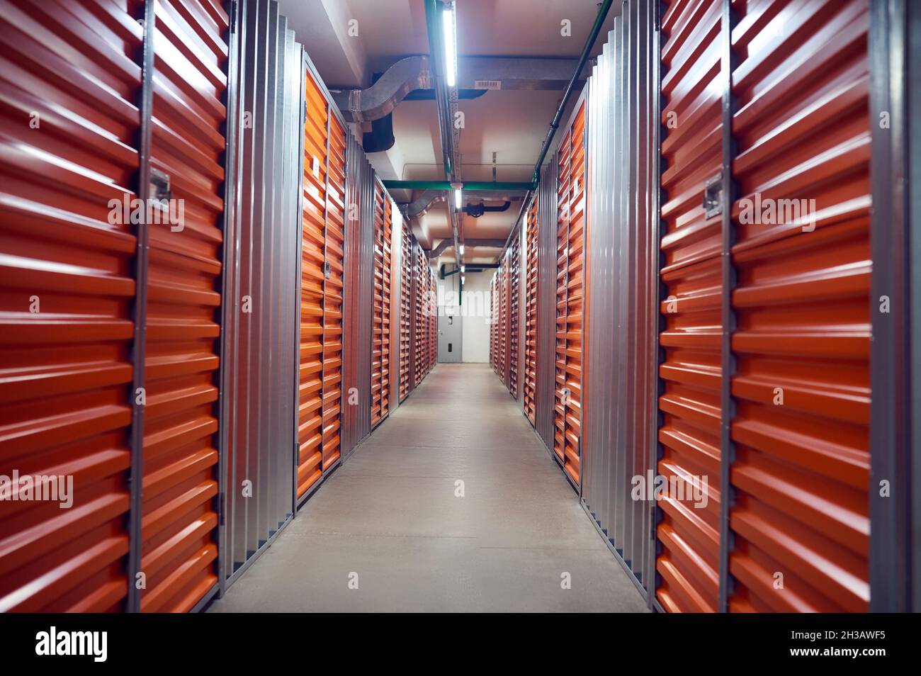 Closed storage containers in modern warehouse Stock Photo - Alamy