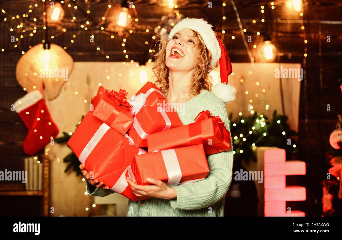 Girl with gifts presents. Christmas is by far most awaited for holiday ...