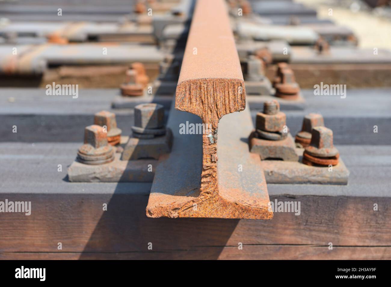 Rusty train track rail Stock Photo - Alamy