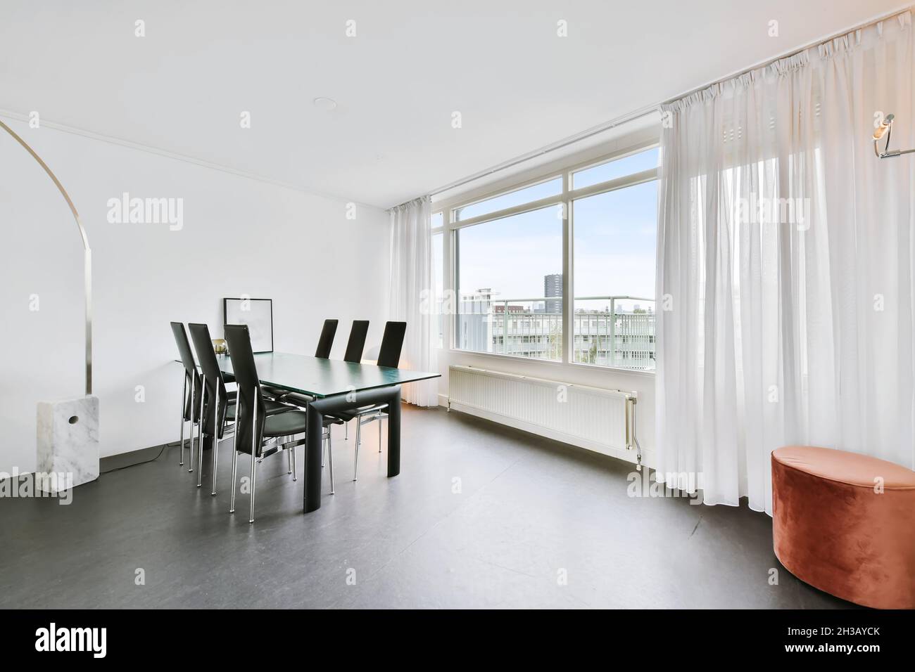 Bright dining room with decorative table and chairs Stock Photo - Alamy