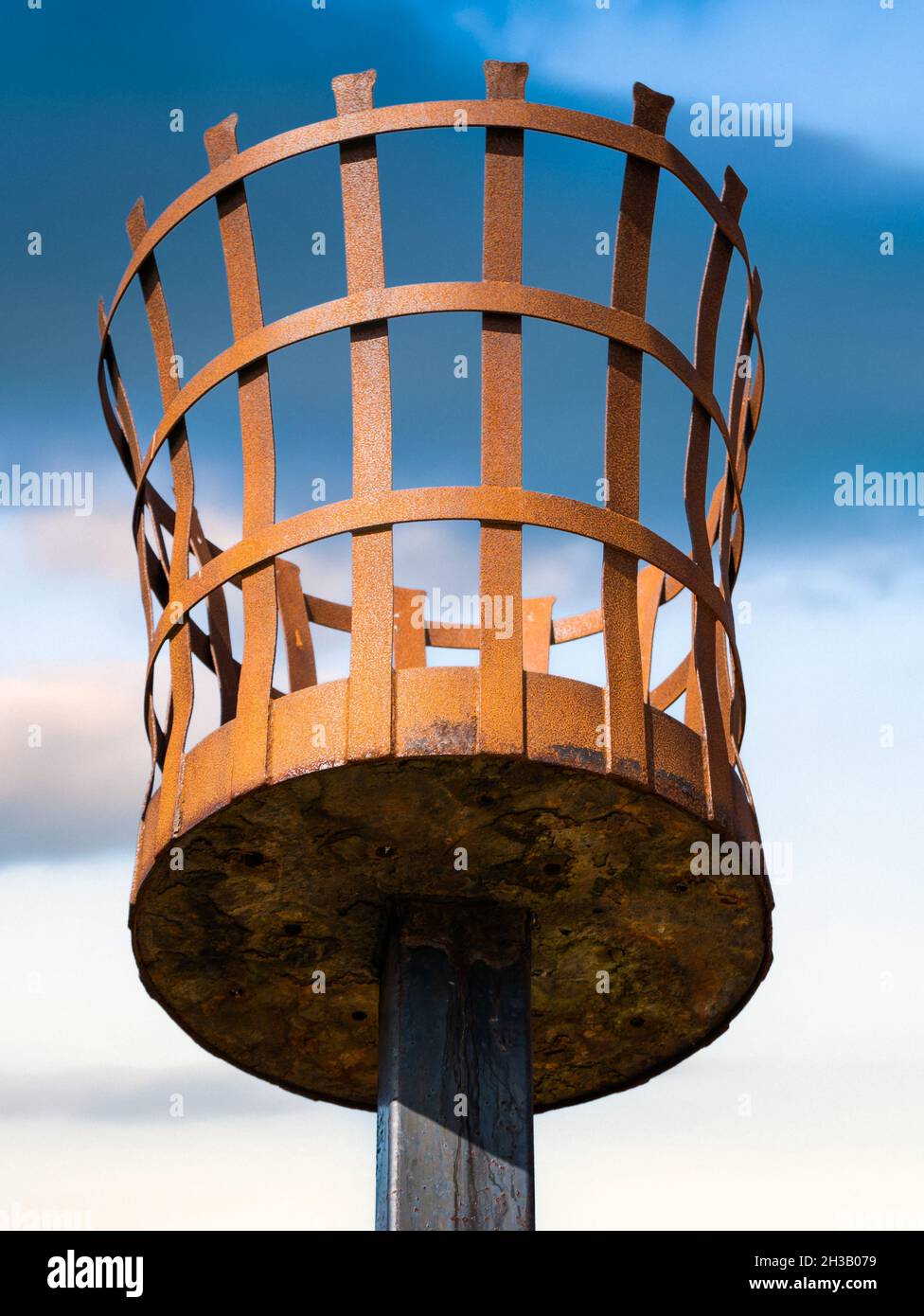 Rusty old Fire Beacon basket on Greatstone Beach with a deep blue sky ...
