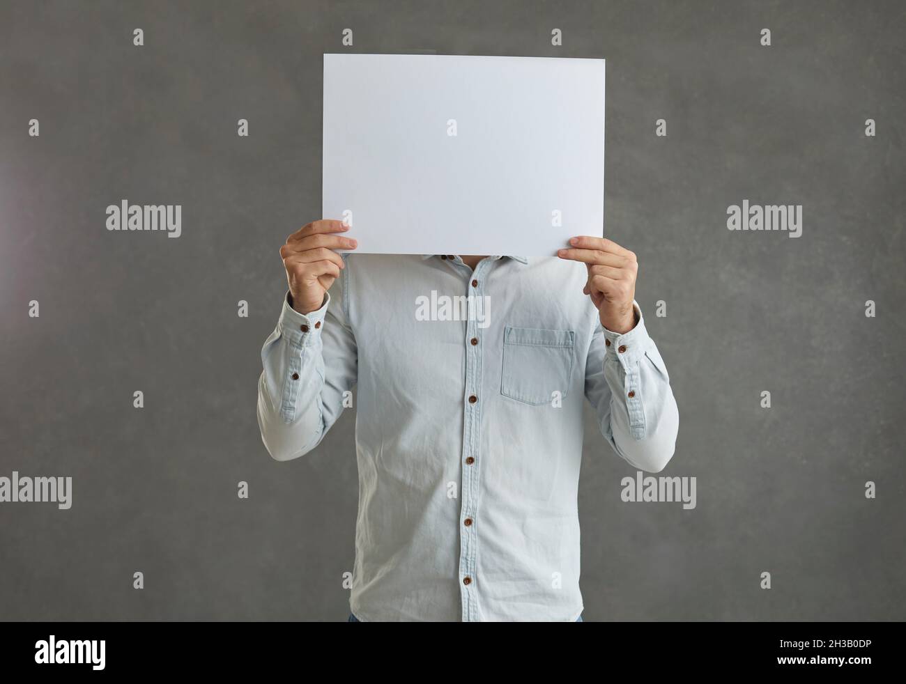Person holding poster template hi-res stock photography and images - Alamy