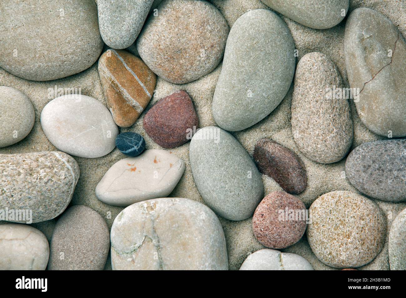 stone pebbles background Stock Photo - Alamy