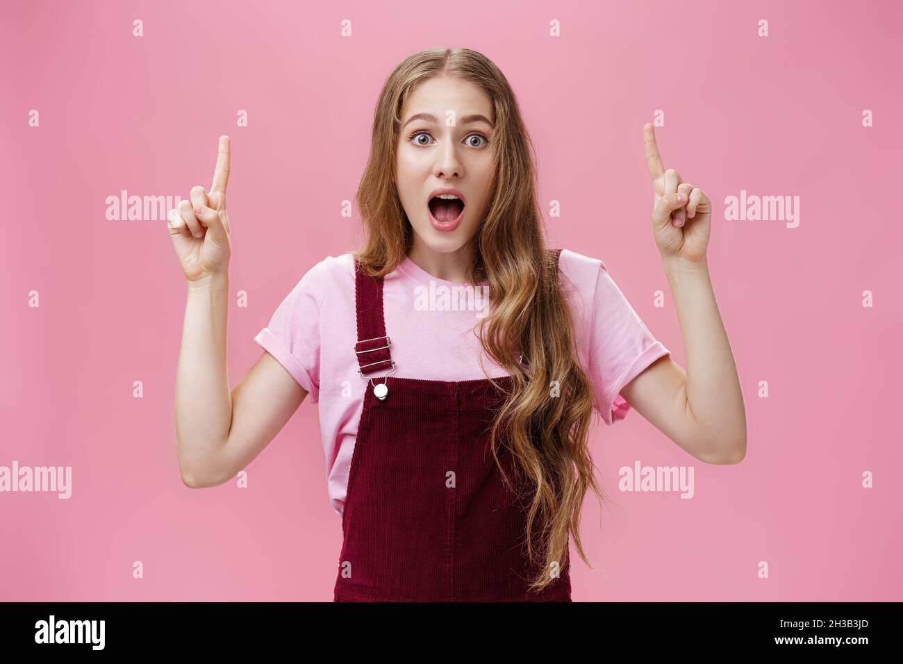 Cute active and charismatic young woman with wavy hair, small scar and ...