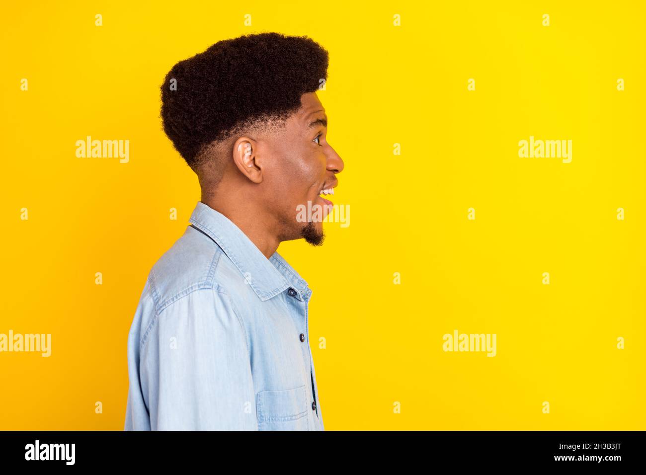Photo of funky impressed dark skin man wear jeans shirt looking empty ...