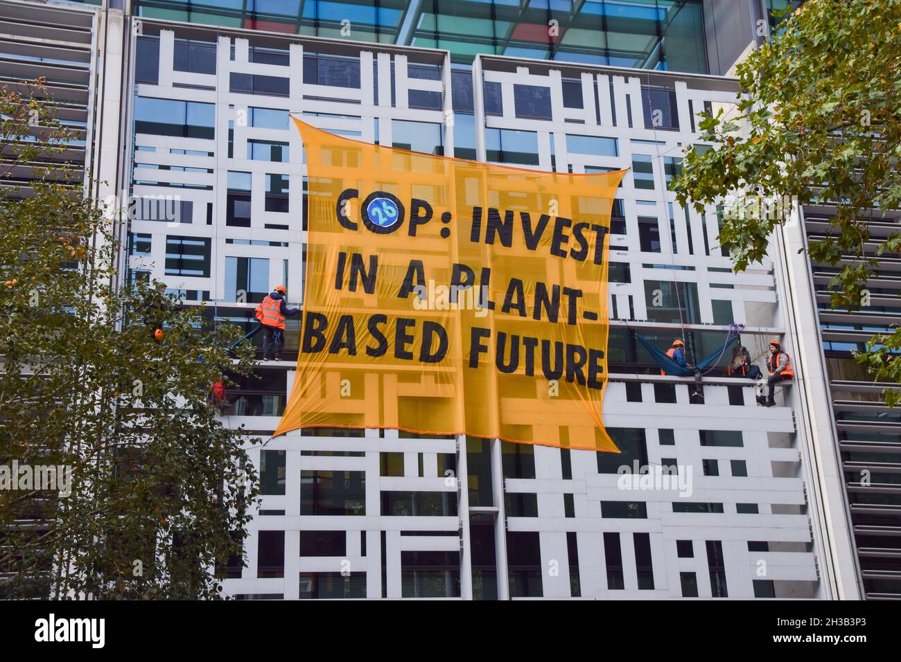 London, UK. 26th October 2021. Animal Rebellion activists scaled the ...