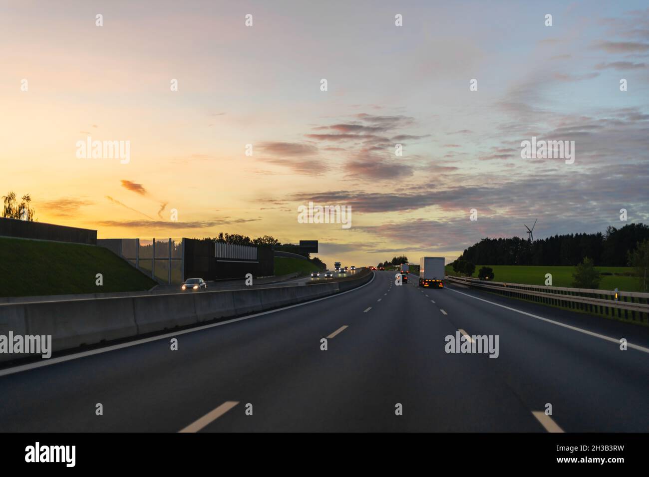 Highway view at sunset.Motorway background Stock Photo - Alamy