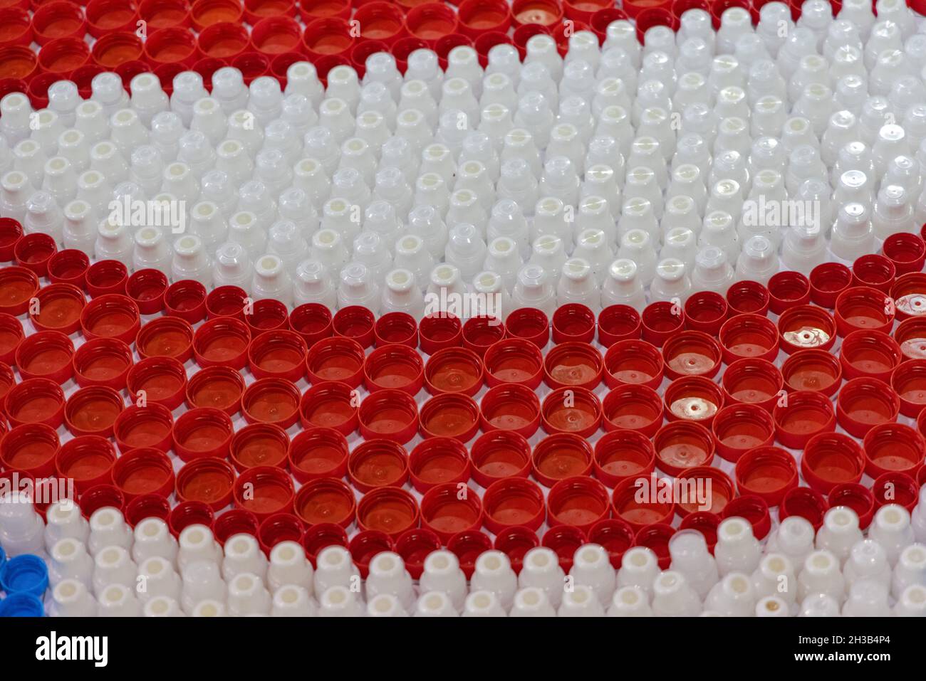Red Screw Bottle Lids and Red Sport Caps Plastic Recycling Stock Photo ...
