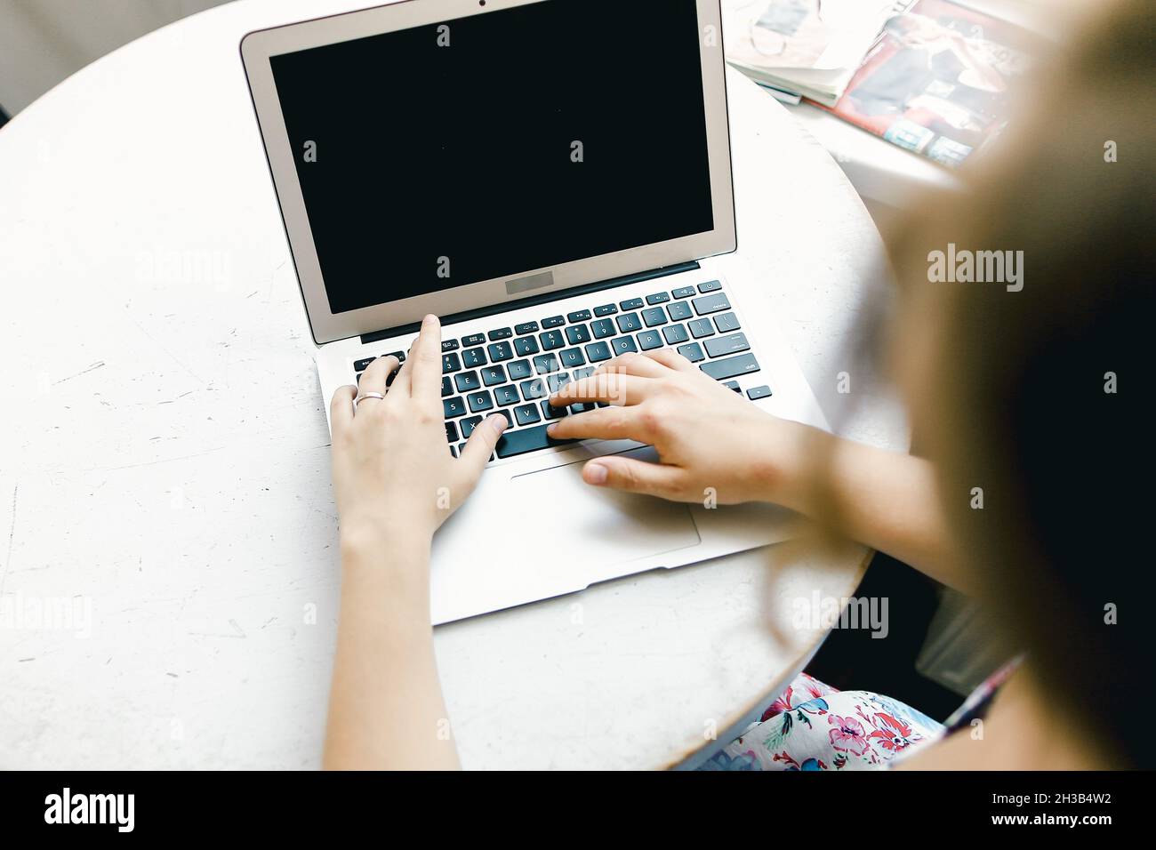 Laptop typing blurry hi-res stock photography and images - Alamy