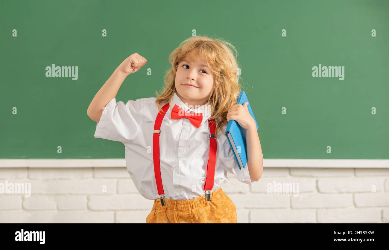 knowledge day. concept of education. nerd kid with long hair at ...