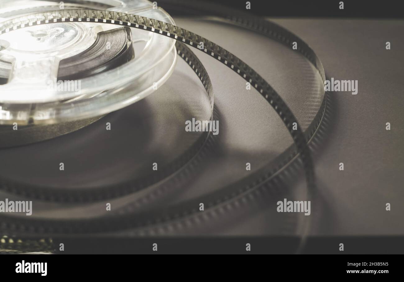 Old spools with black and white film stock. Retro style Stock Photo - Alamy