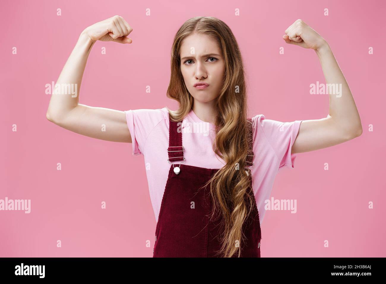 Girl shows she strong and independent. Serious-looking confident ...