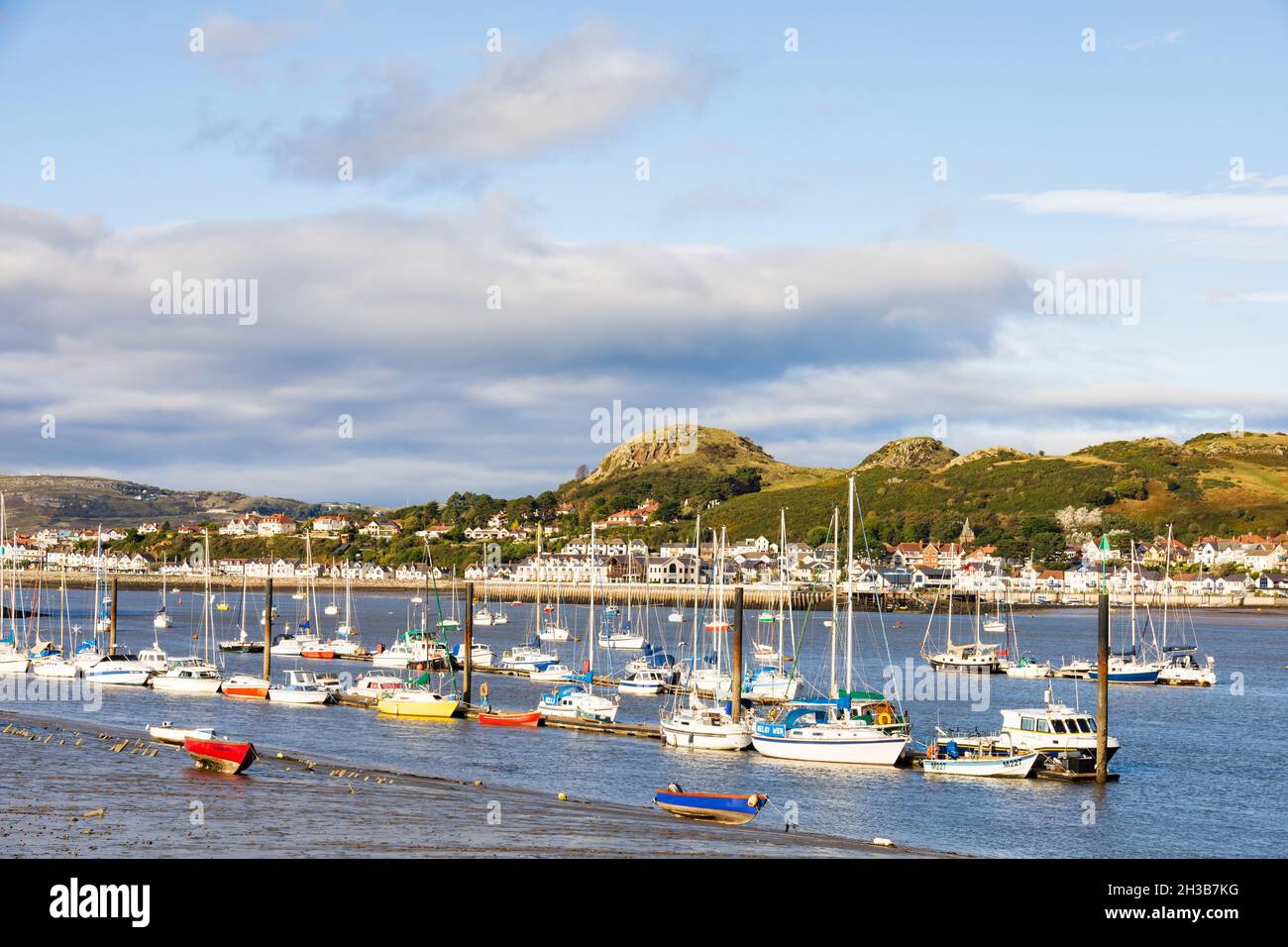 Small boats anchored in the River Conwy estuary, Conwy, Glwyd, Wales ...