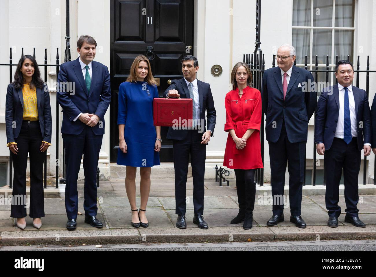 Chancellor of the Exchequer Rishi Sunak displays the red budget ...