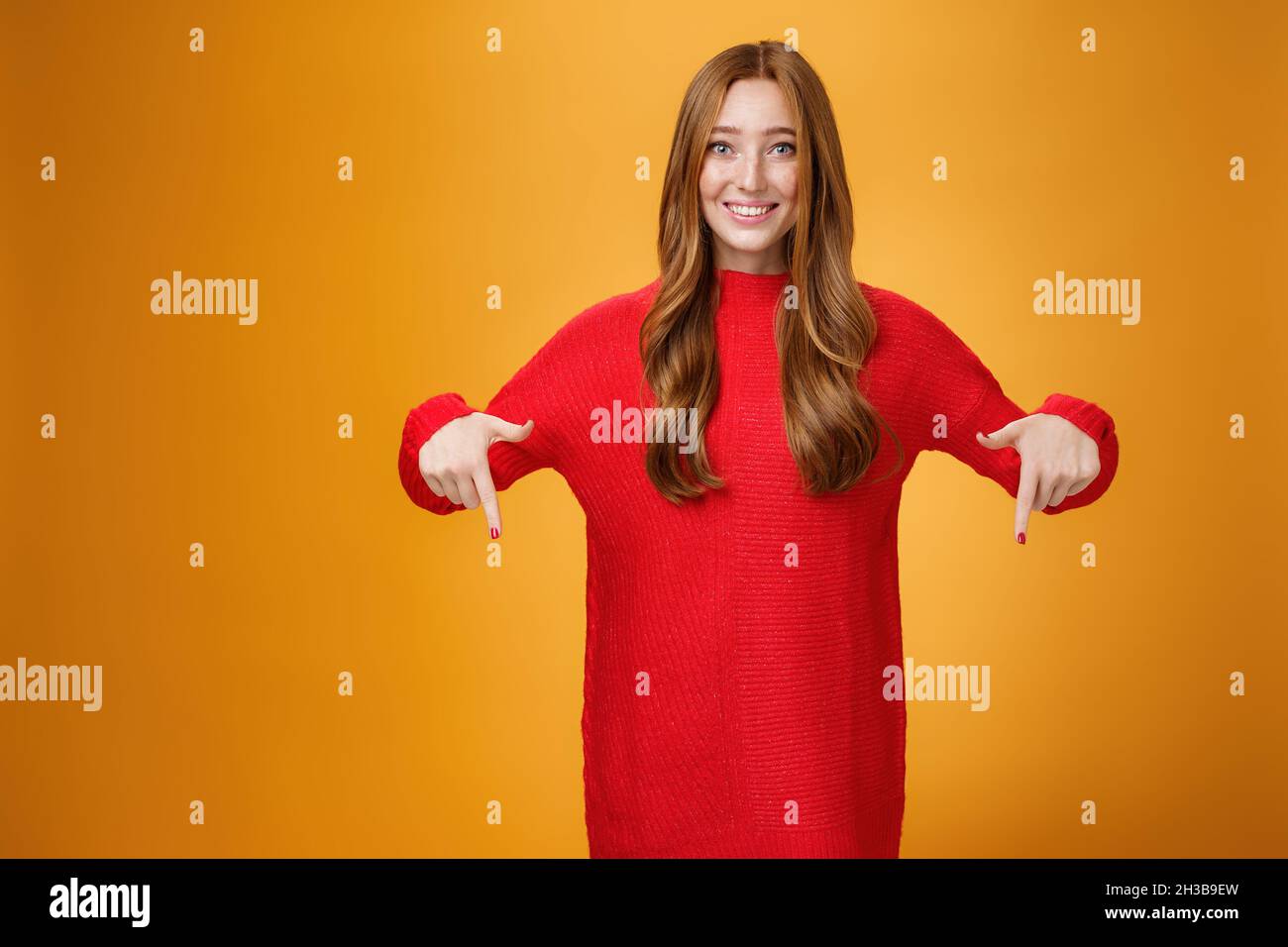 Gentle and tender cute ginger girl with freckles and blue eyes feeling ...