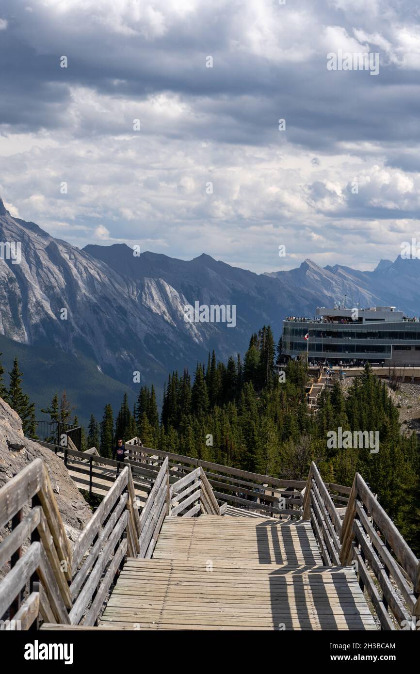 Pov of a mountain bridge leading to mountain Sulphor Hill Station Banff ...