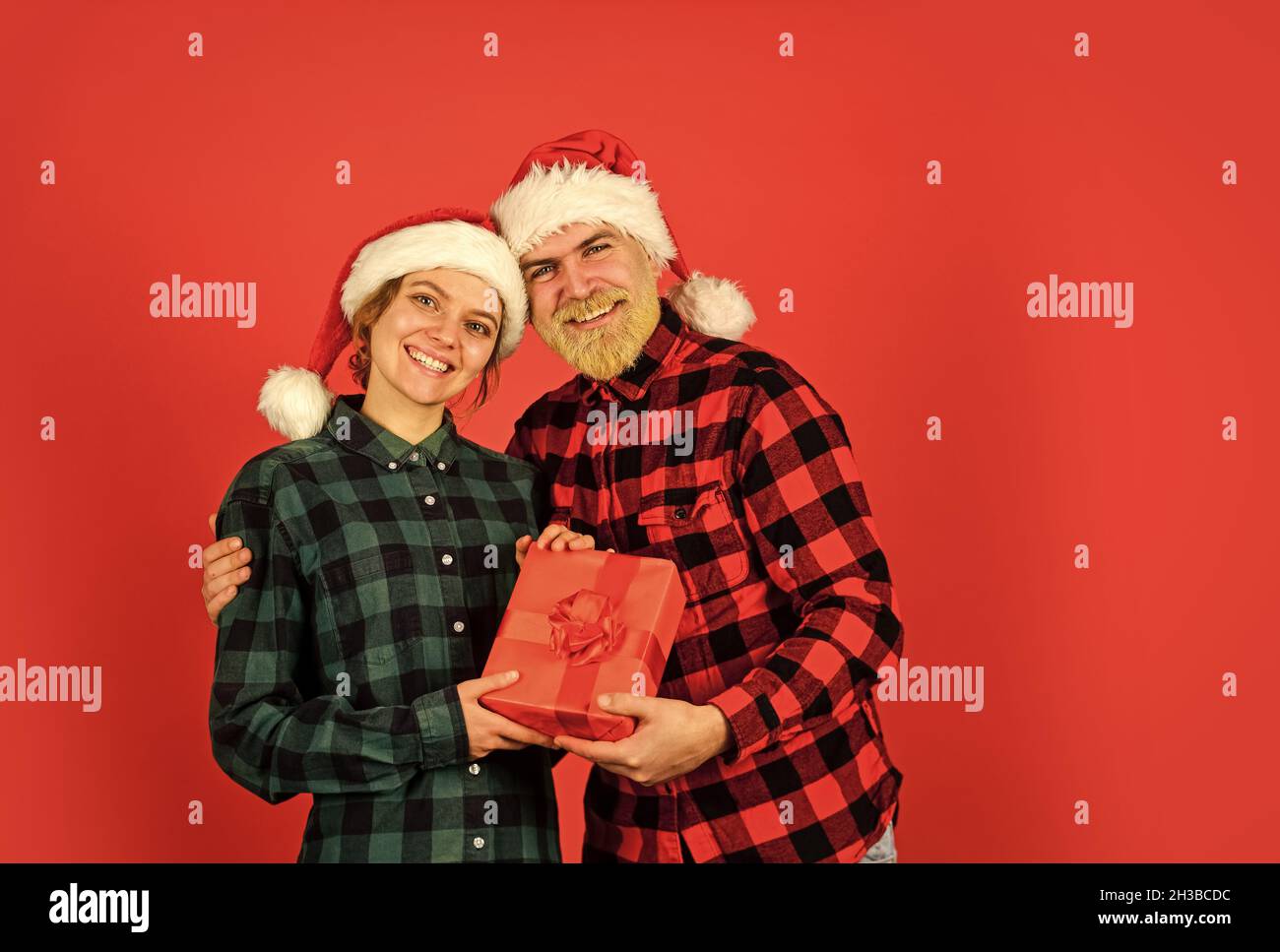Buy present. Christmas time. Man and woman christmas holiday ...