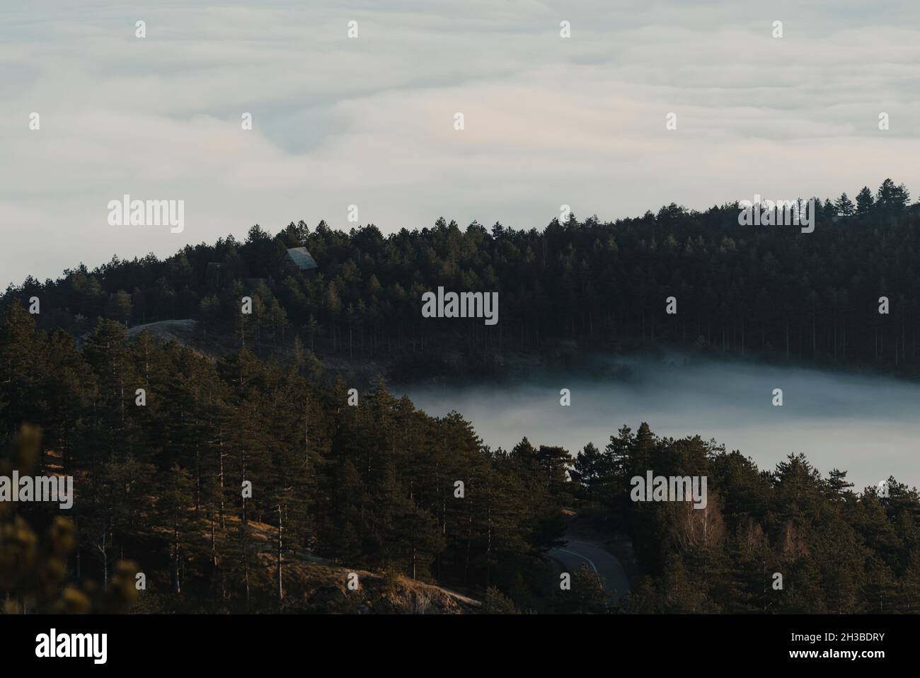 Thick clouds layer hills hi-res stock photography and images - Alamy