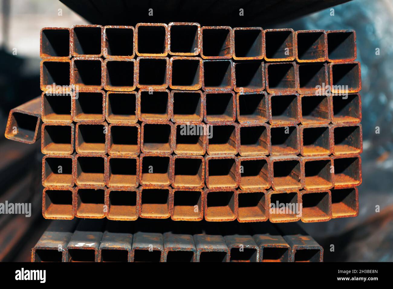 Steel profile on a warehouse rack . Pile of metallurgical production ...
