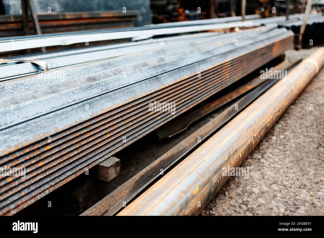 Stacks of metal on the warehouse . Business and metallurgical ...