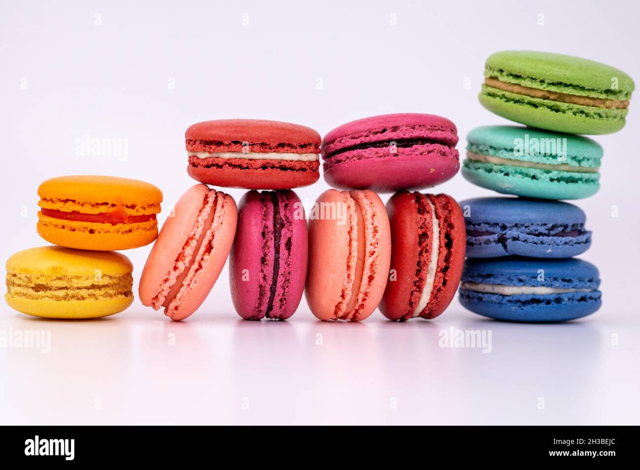 Happy rainbow of French Macarons Stock Photo - Alamy