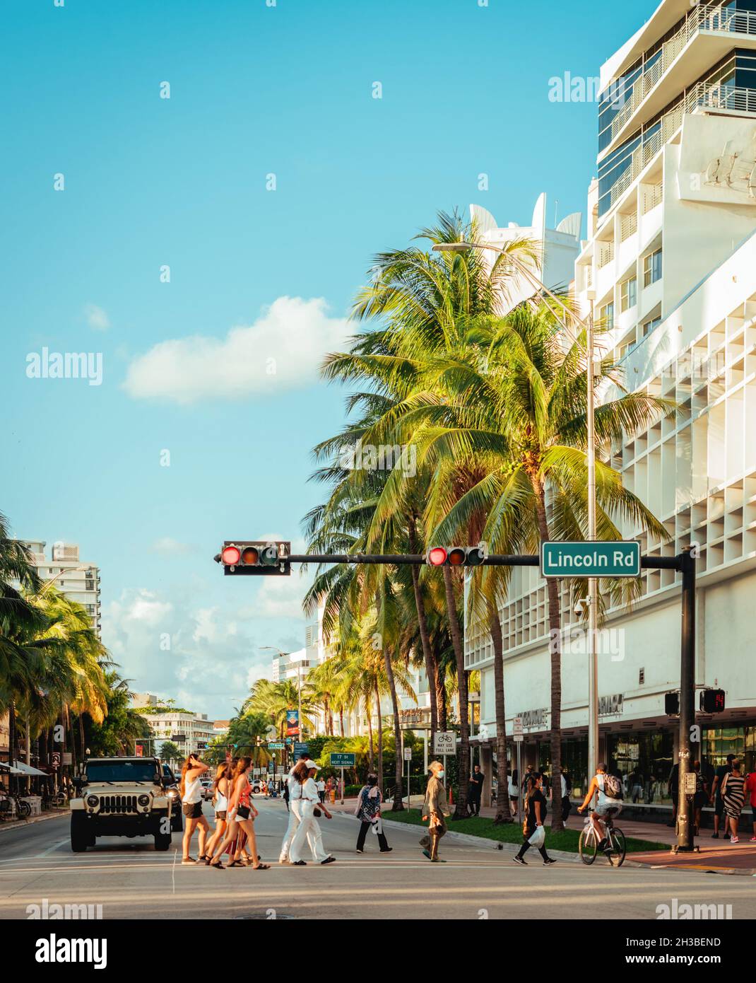 street Miami Beach people tourism palms Stock Photo - Alamy