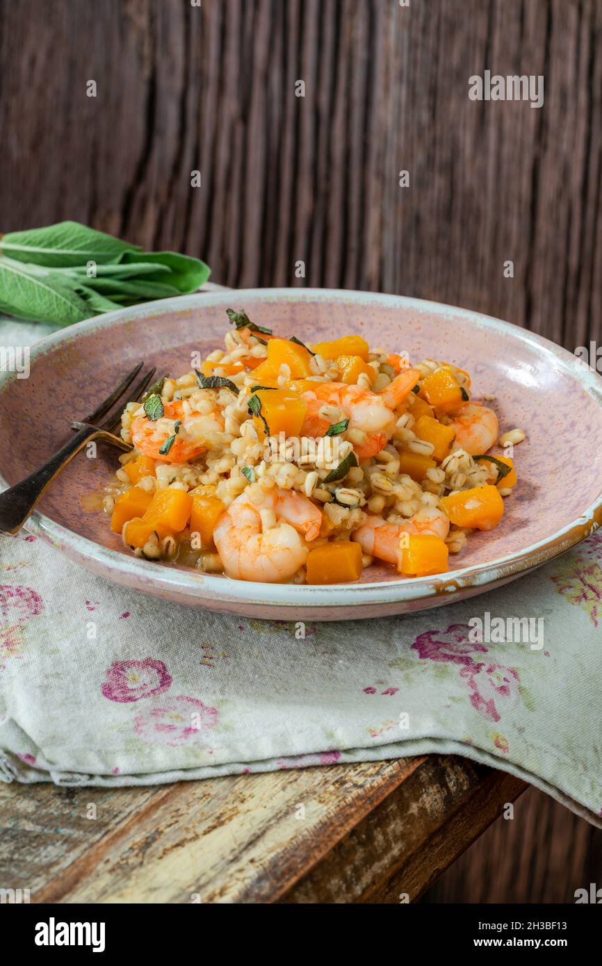 Pearl barley risotto with king prawns, butternut squash and sage Stock ...