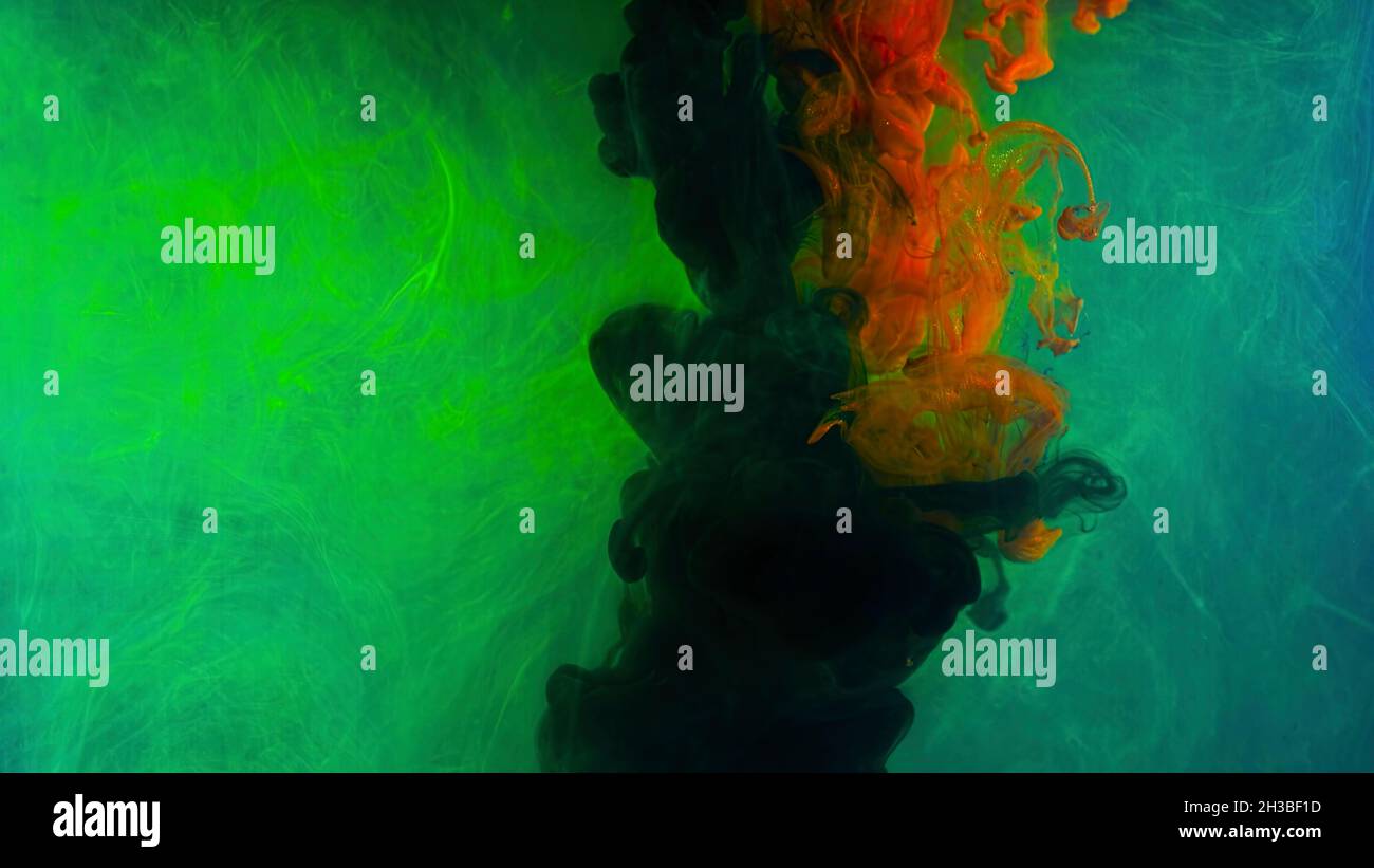 Smoky splash of color in water. Stock footage. Colored ink or acrylic ...