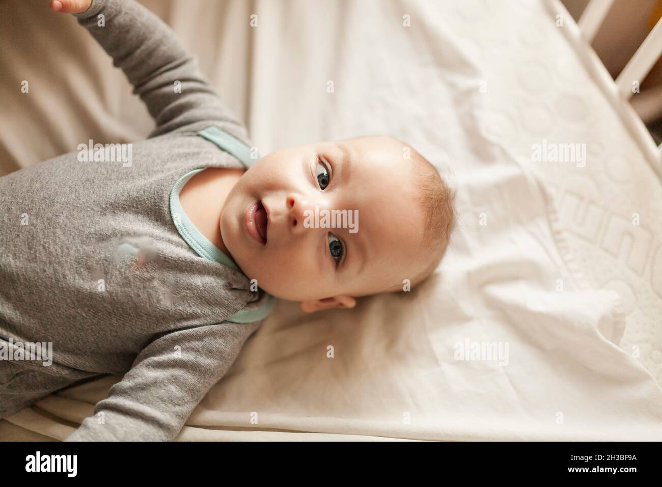 Half lying child hi-res stock photography and images - Alamy