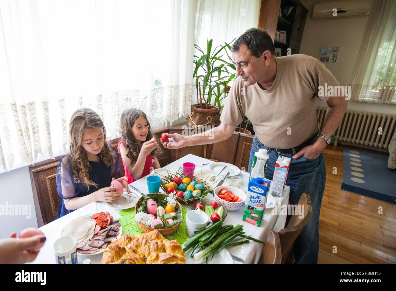 Traditional celebration of Orthodox Easter within the family, festive ...